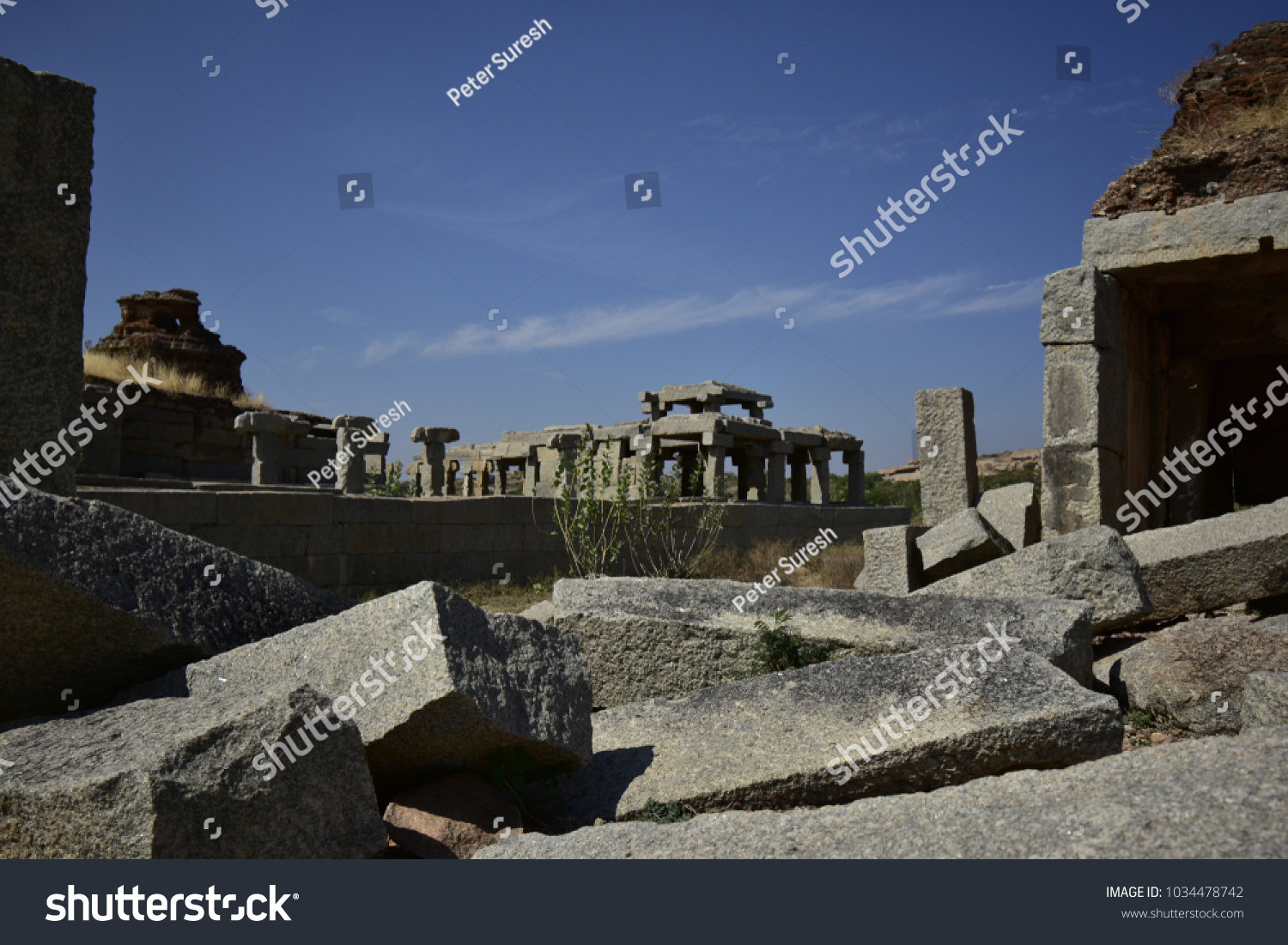 Granite stone slabs in the foreground of a 14th century ruins site of ...