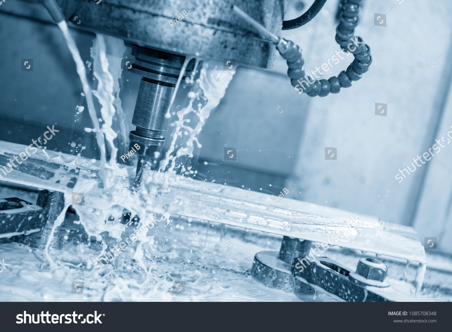 The CNC milling machine cutting the rubber tire mold part with the ...