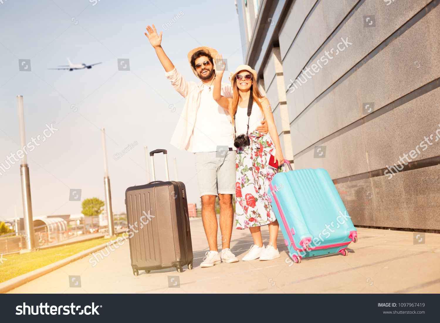 Love couple at the airport says goodbye to a friends and going to ...