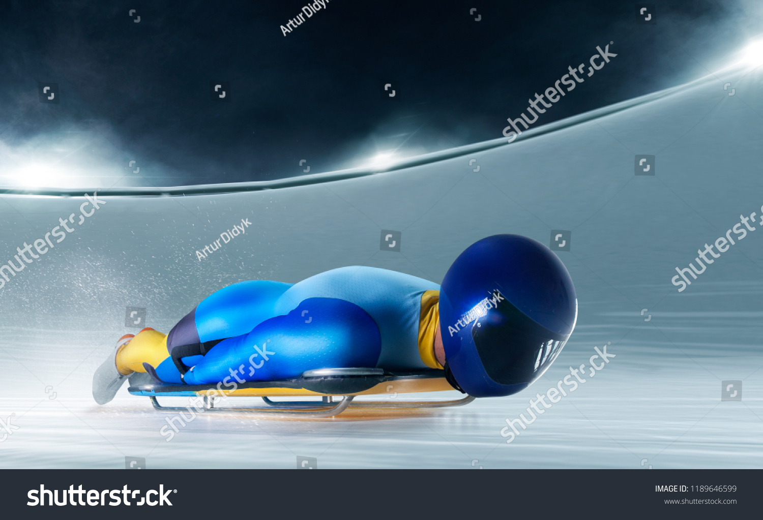 Skeleton sport. Bobsled. The athlete descends on a sleigh on an ice ...