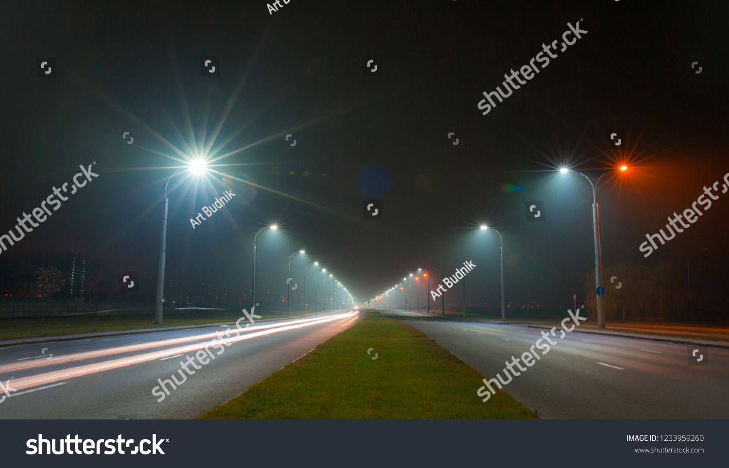 Street lights foggy misty night lamp post lanterns deserted road ...