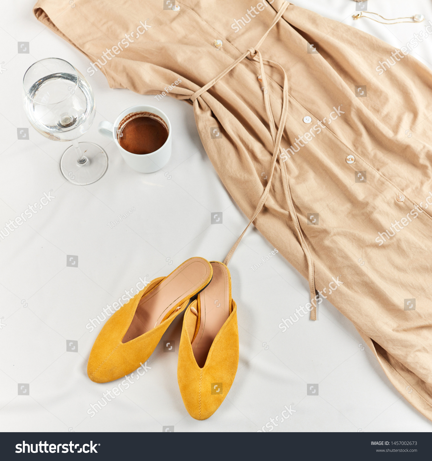 comfortable sandals and dress for summer holiday. girl has prepared ...