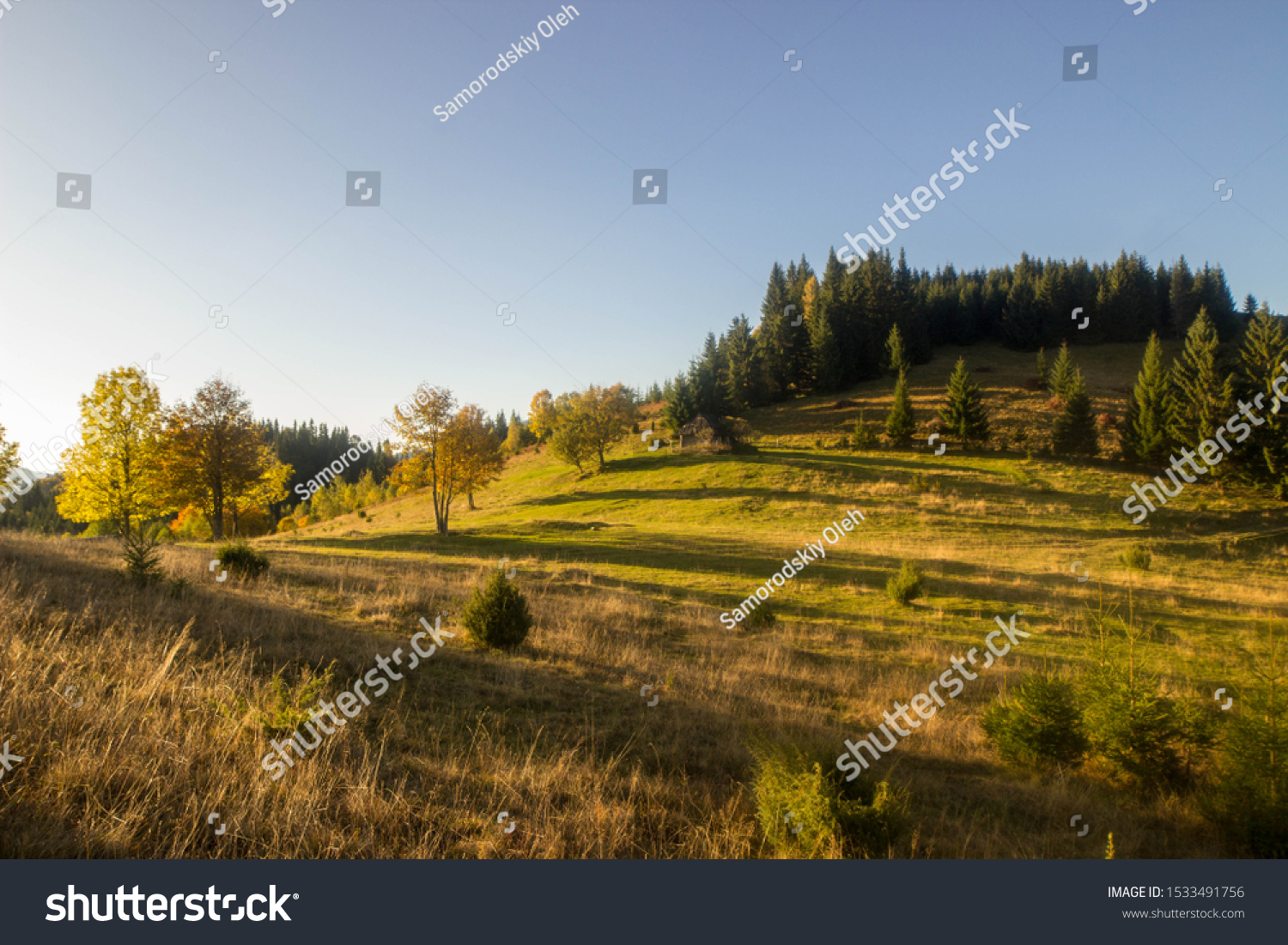 Mountain rural area in autumn season Agricaltural field on a hill near ...
