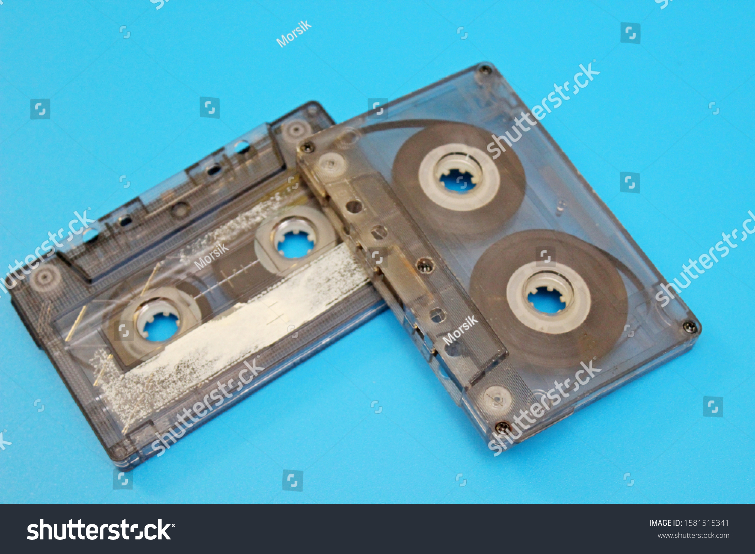 Old transparent audio cassettes located on a blue background_站酷海洛_正版图片 ...