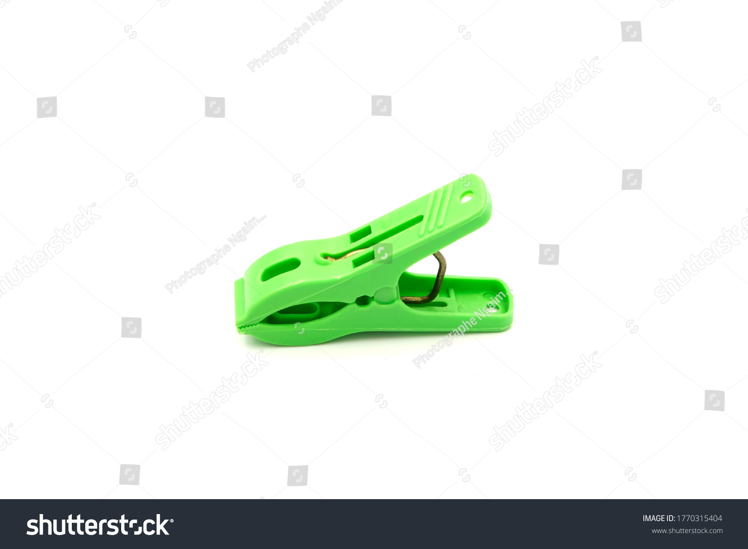 Green clothes peg isolated on white blackground_站酷海洛_正版图片_视频_字体_音乐素材交易 ...