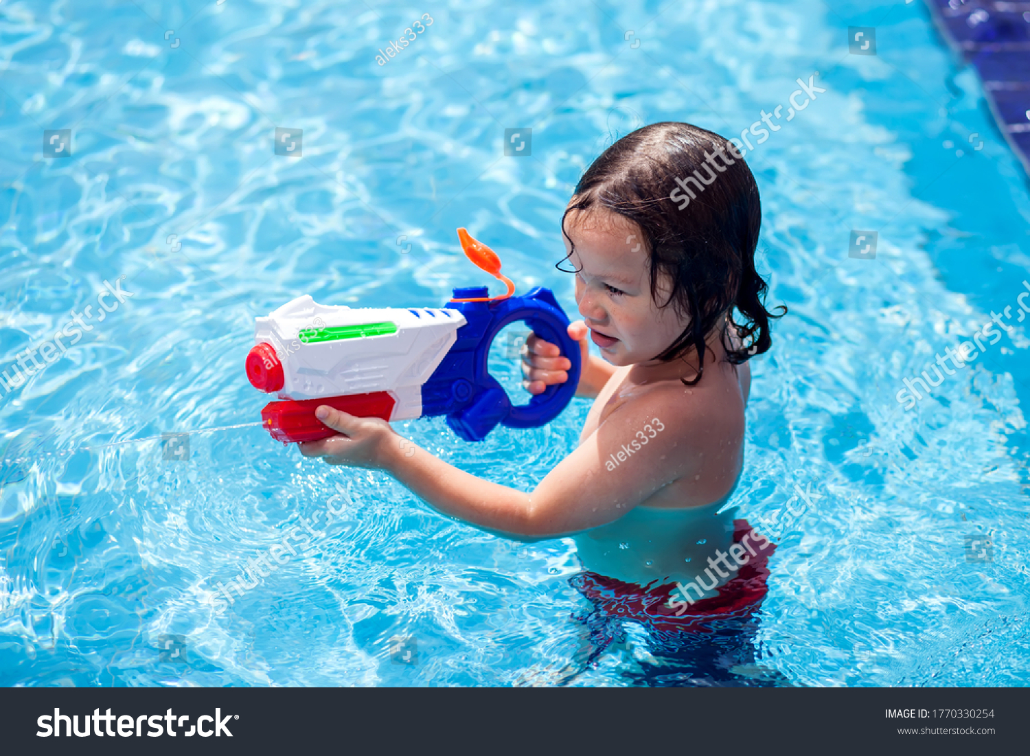 Kid boy playing in the swimming pool. Childhood summer and holiday concept_站酷海洛_正版图片_视频_字体_音乐素材 ...