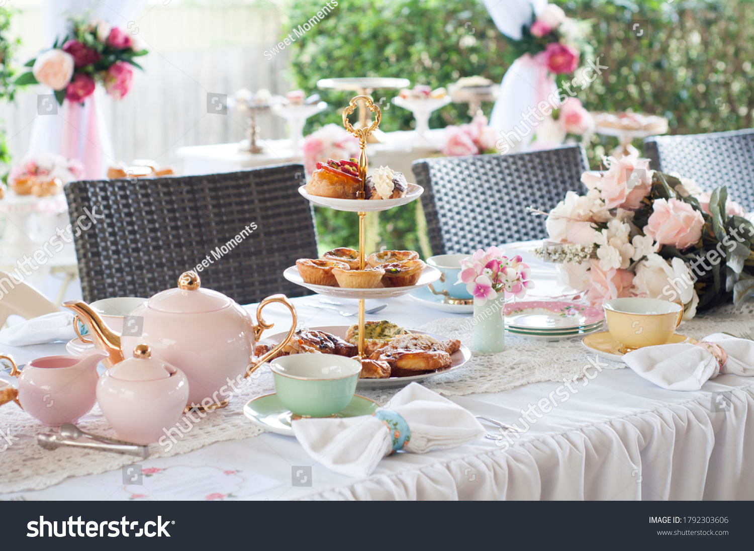Pastel high tea set up featuring pastel pink blue yellow and green ...