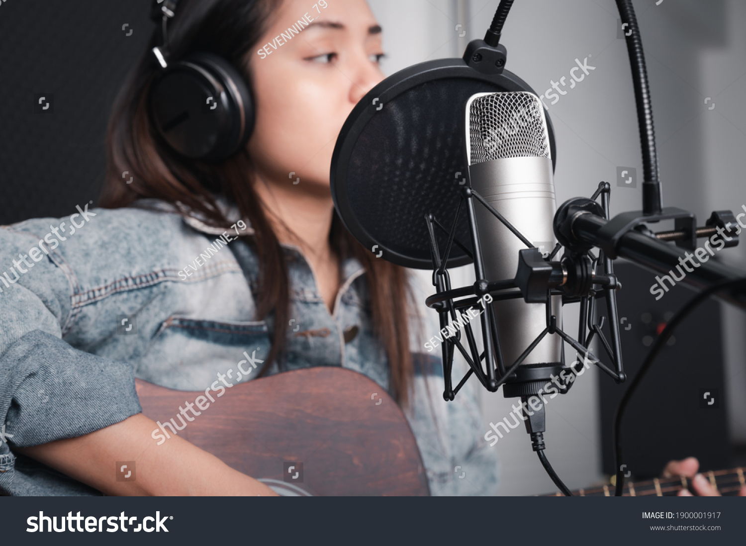 Asian female singer with a passion for music and microphone. While ...