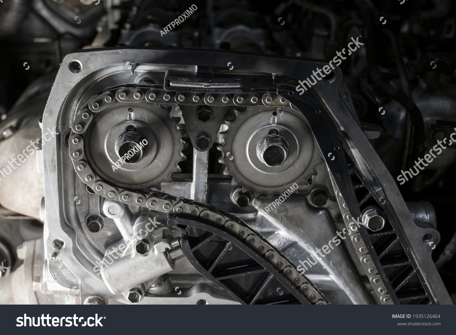 New car timing chain on a diesel old engine in a car workshop. Close up ...
