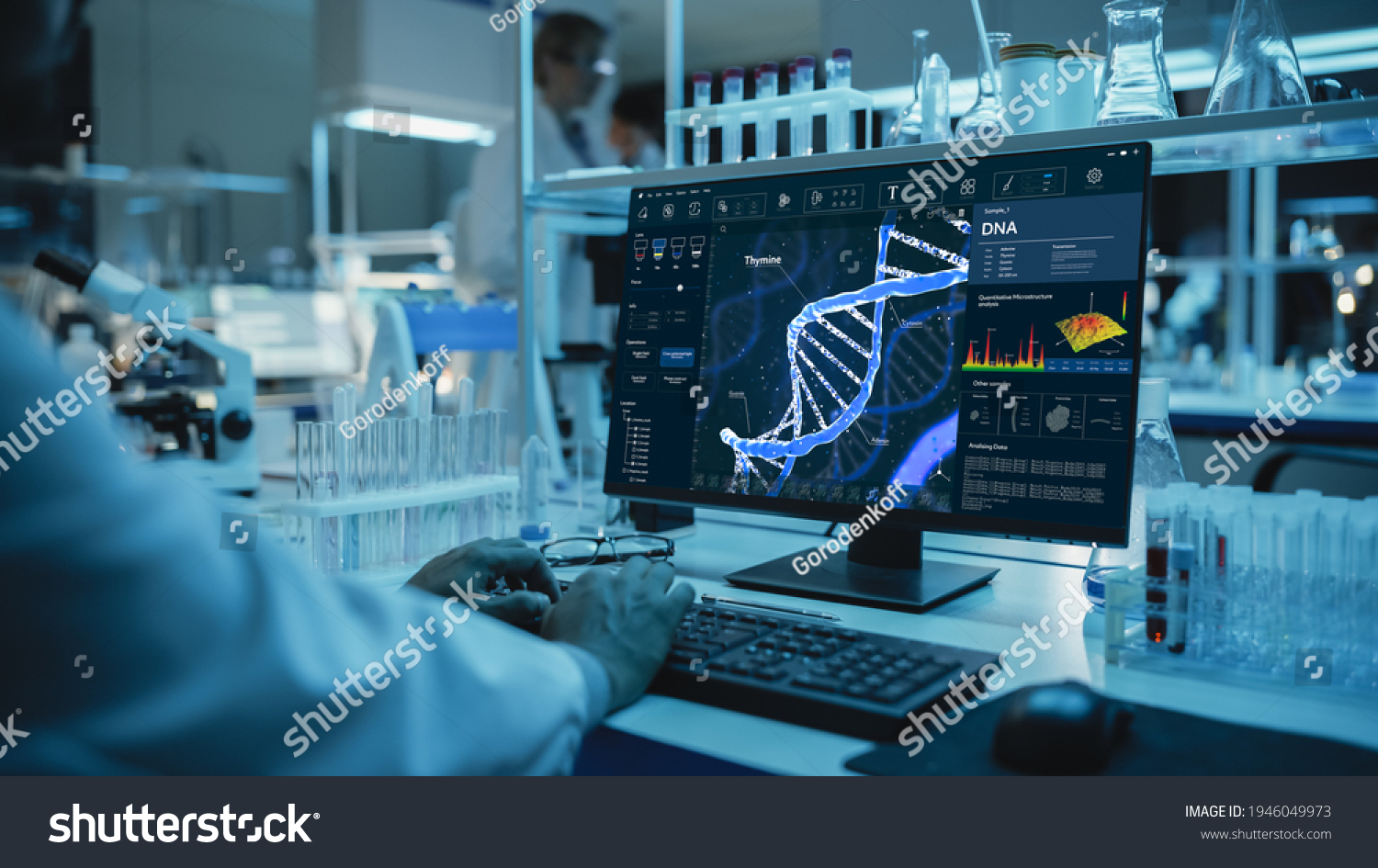 Medical Research Scientist Working On Desktop Computer With Gene Analysis Software In Modern medical-research-scientist-working-on-desktop-computer-with-gene-analysis-software-in-modern