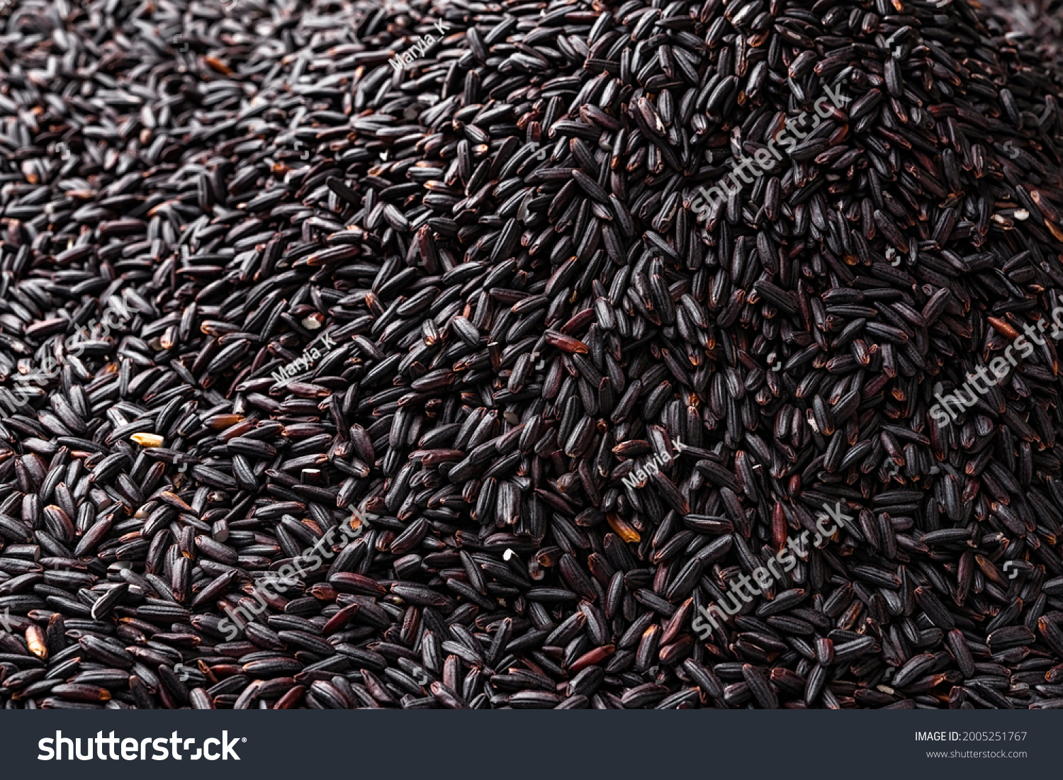 Pile of raw black rice as a background. Texture of uncooked dark rice ...