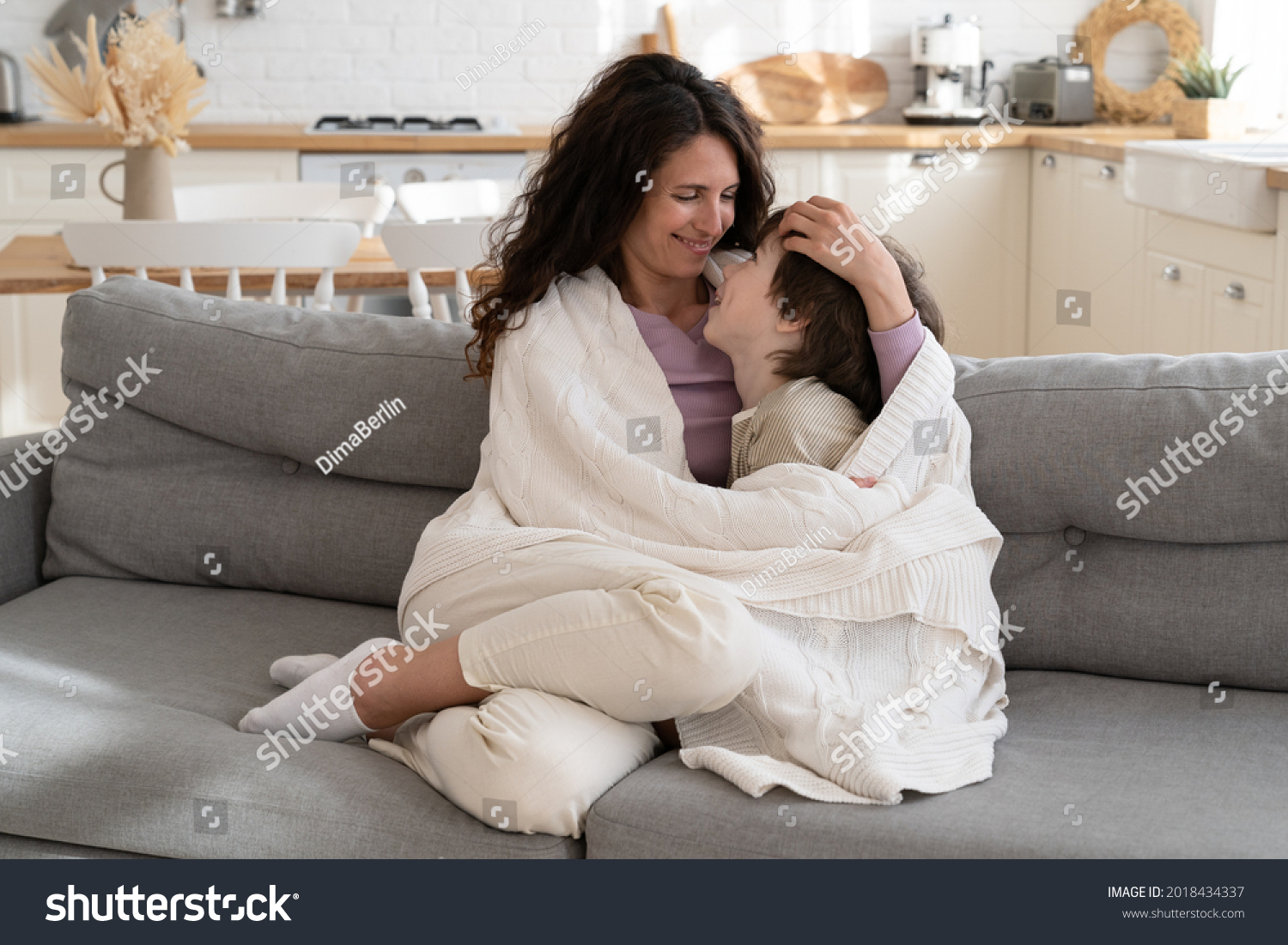 Happy mom has fun with child at home on weekend: loving parent embrace ...