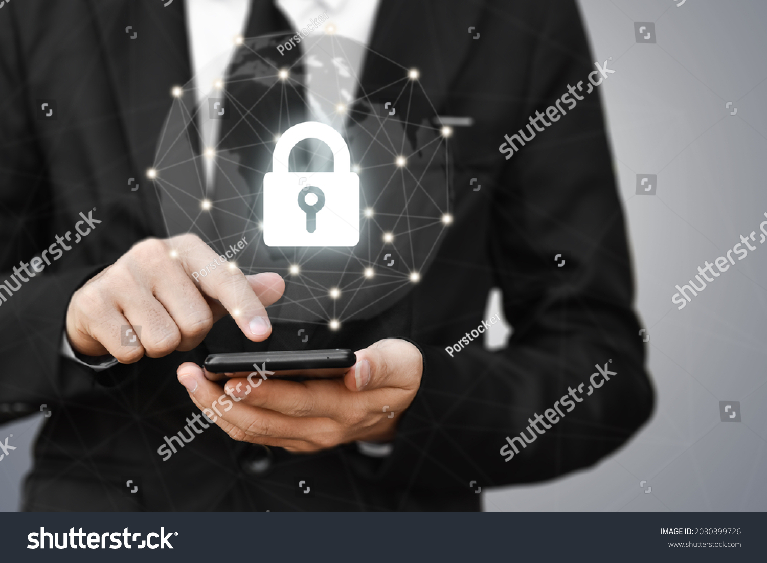 Businessman holding mobile phone with shield lock. Cyber security data ...