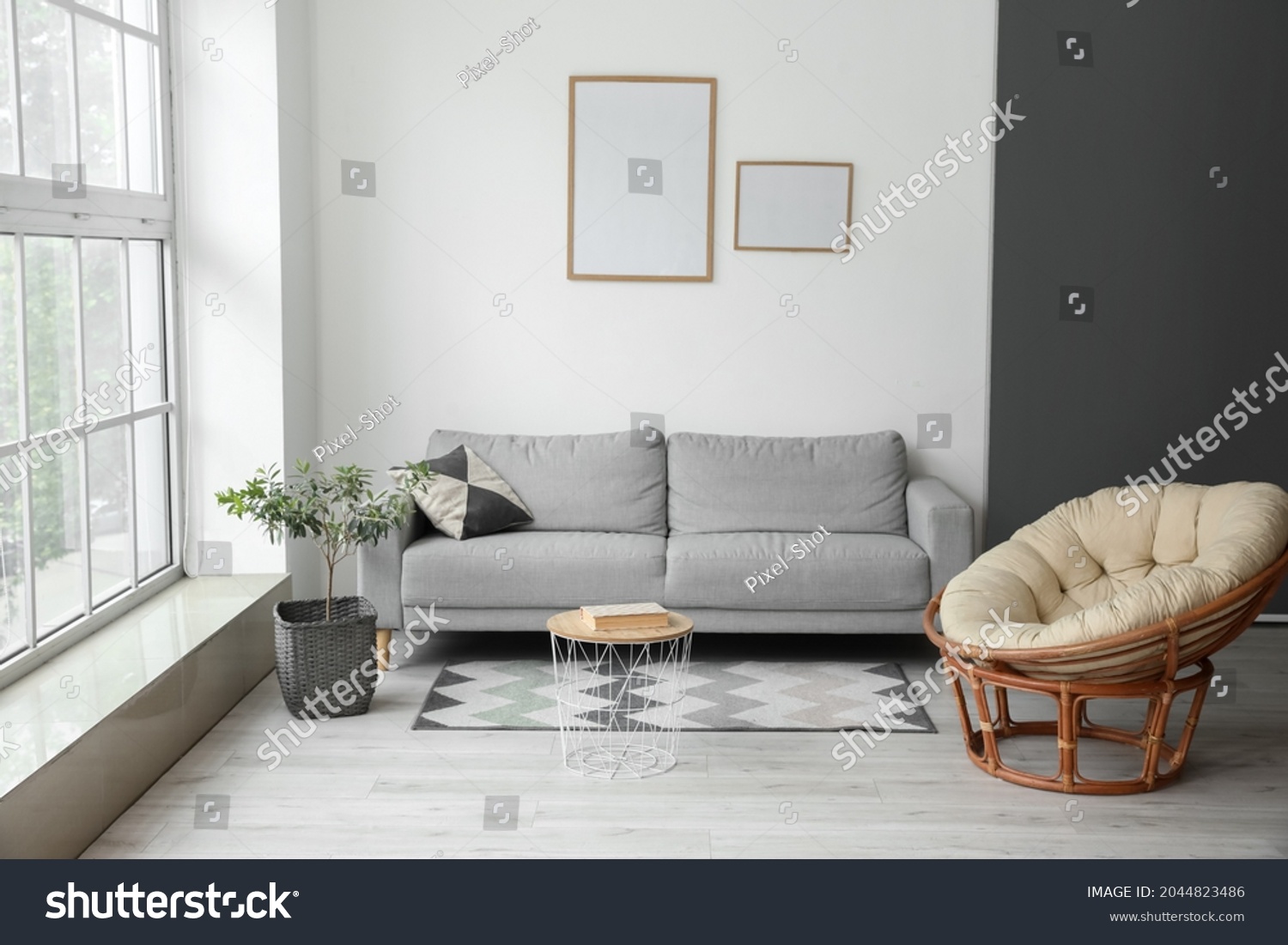 Interior of modern stylish room with sofa_站酷海洛_正版图片_视频_字体_音乐素材交易平台_站酷旗下品牌