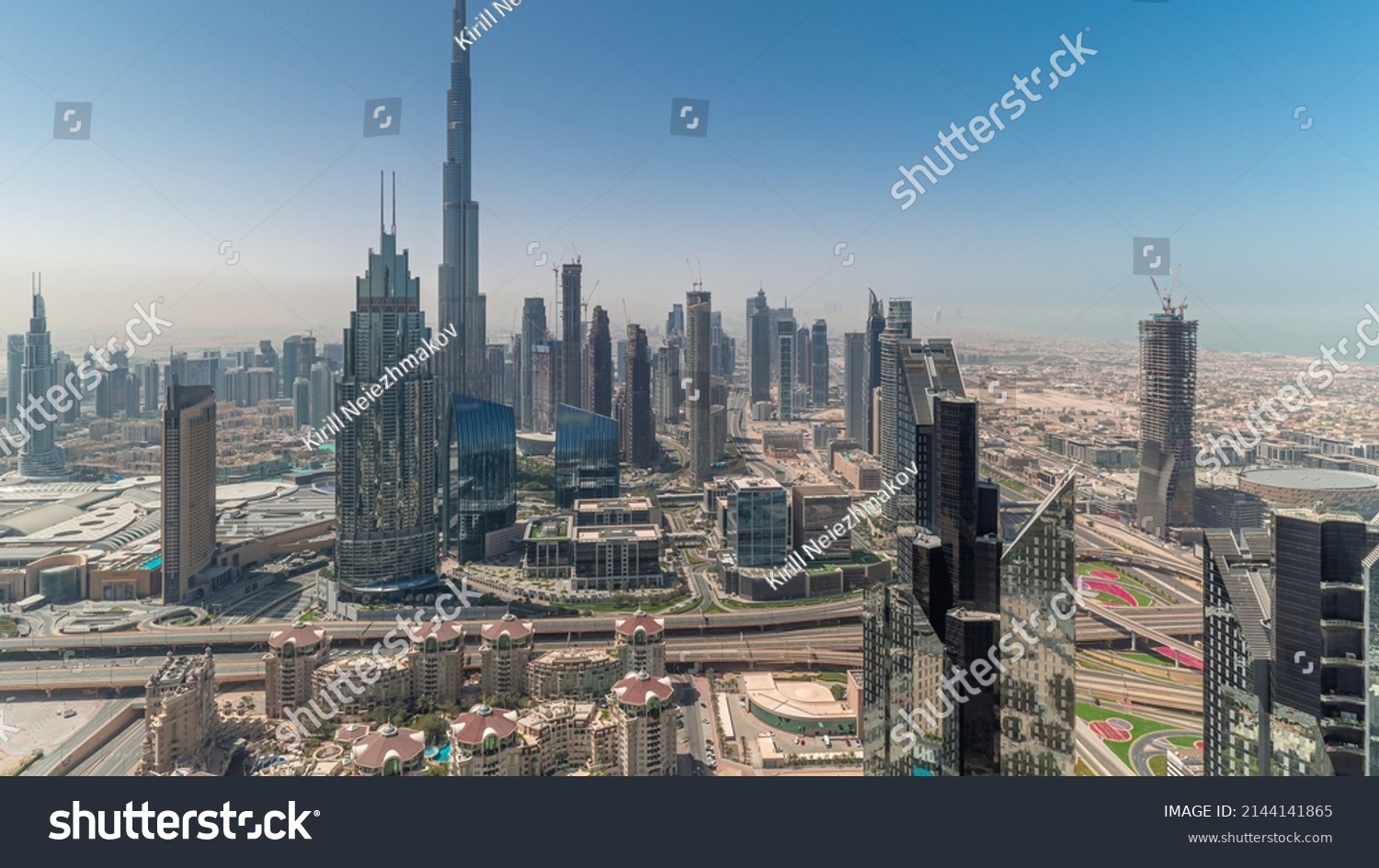 Aerial view of tallest towers in Dubai Downtown skyline and highway ...