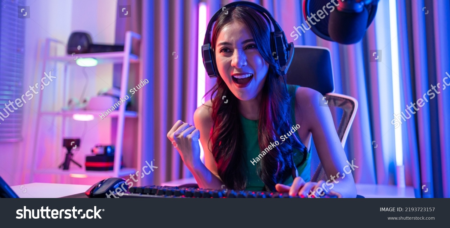 Asian beautiful Esport woman gamer play online video game on computer ...