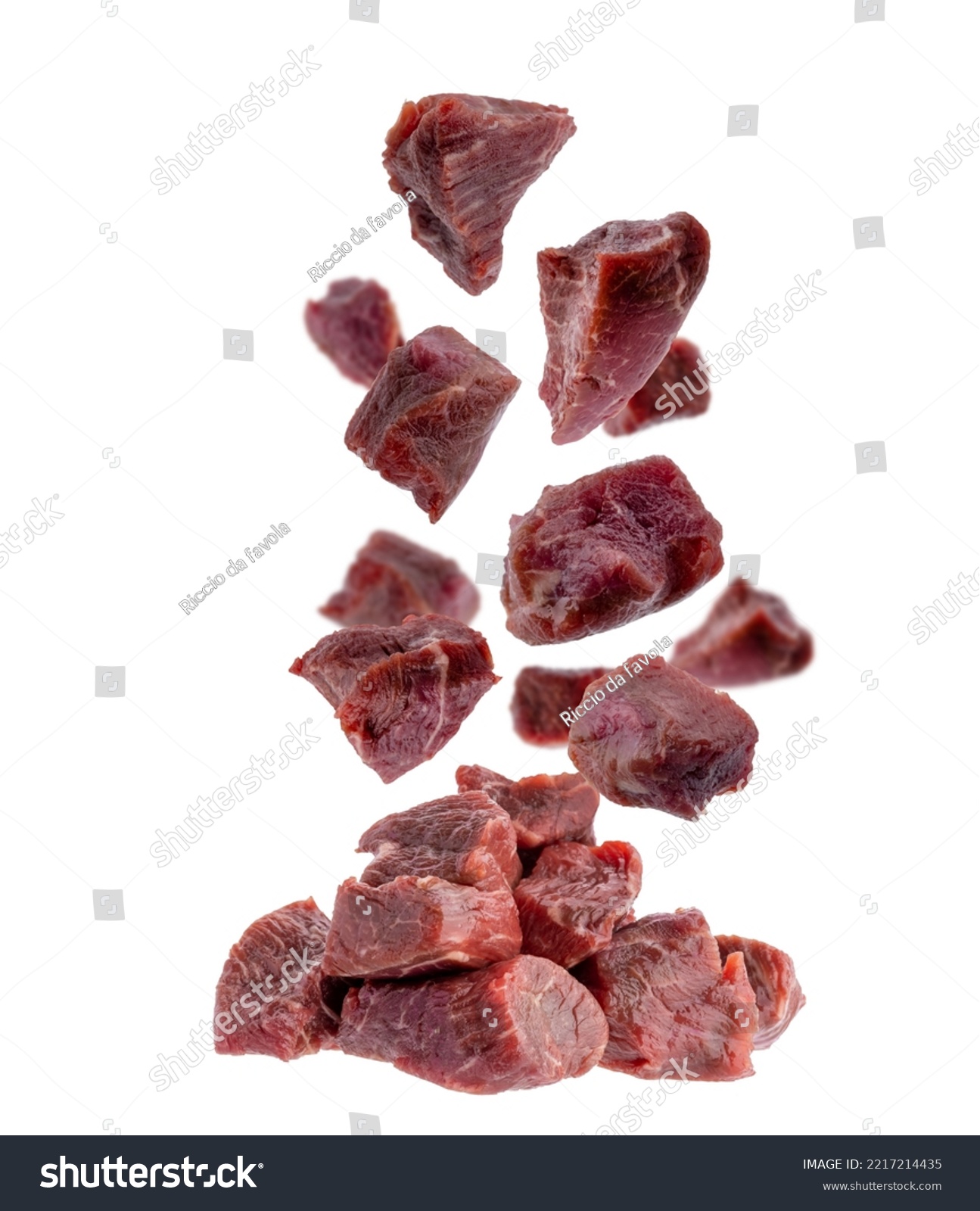 Raw pieces of beef levitating on a white background. Natural meat ...