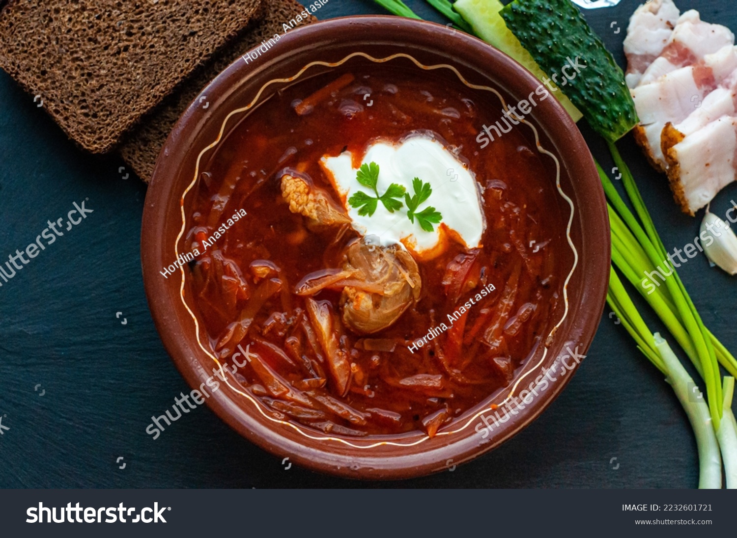 national Ukrainian dish traditional red borscht with sour cream cabbage beets meat lard green ...