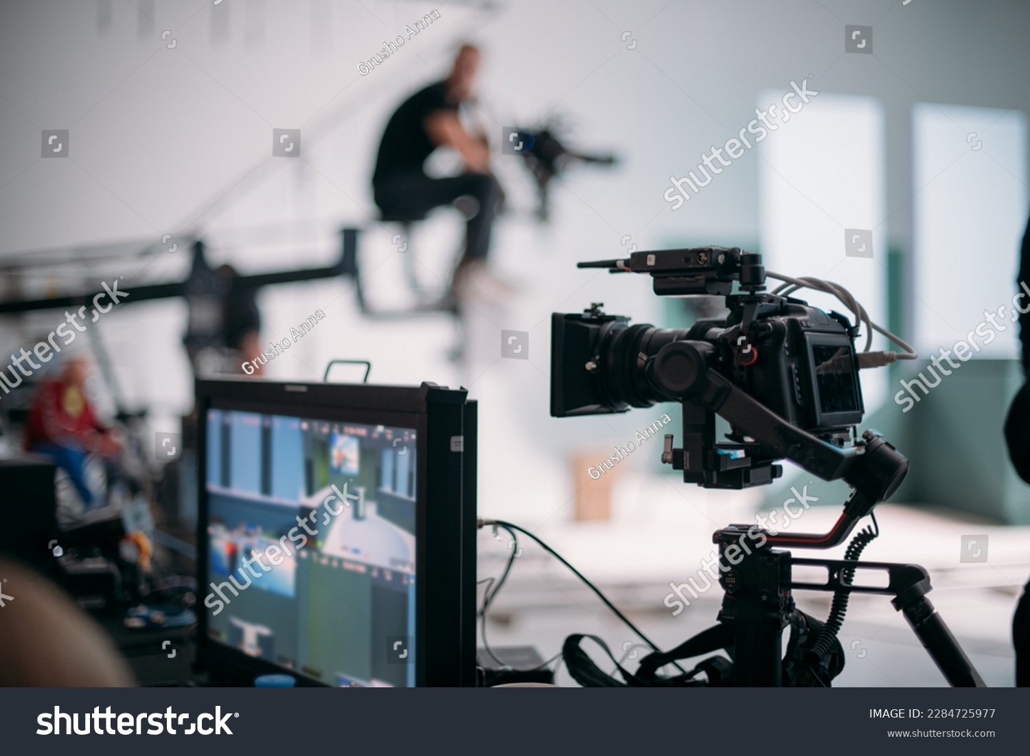 A professional film and video camera on the set. Filming day equipment ...