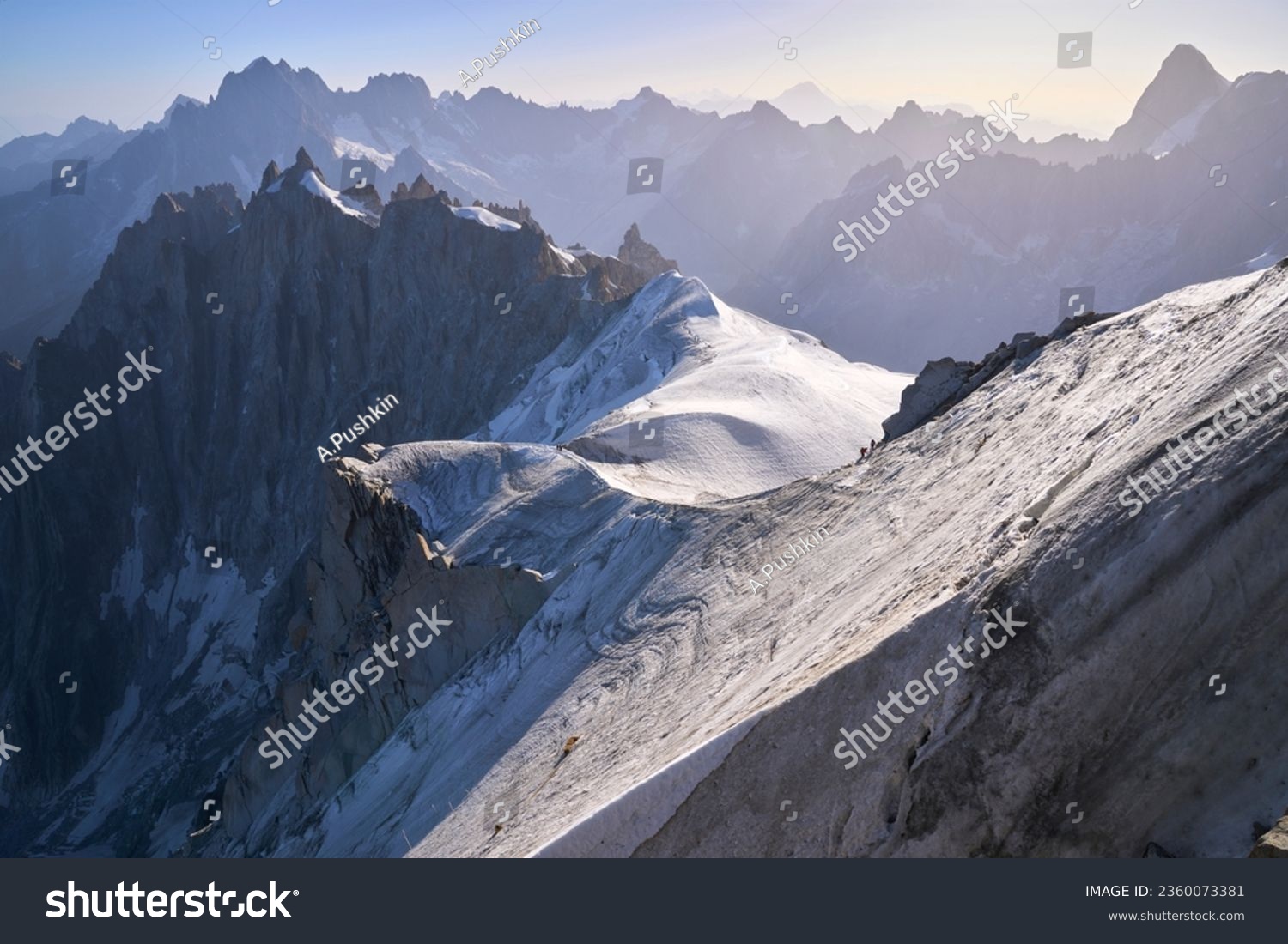 The steep and extremely exposed ice ridge to descend to the glacier ...
