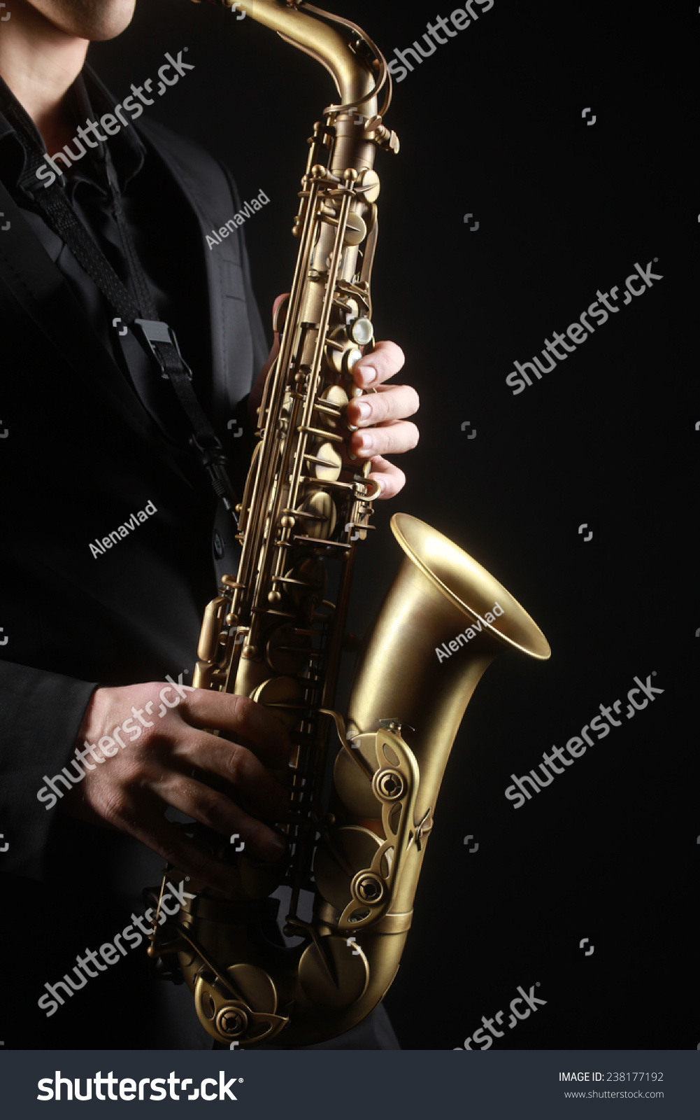 Saxophone classical music instrument Saxophonist with alto sax closeup ...
