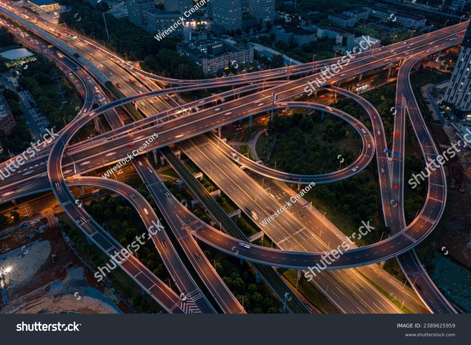 Aerial view of bustling Wuhan Optics Valley Avenue overpass during the evening rush hour_站酷海洛_正版 ...