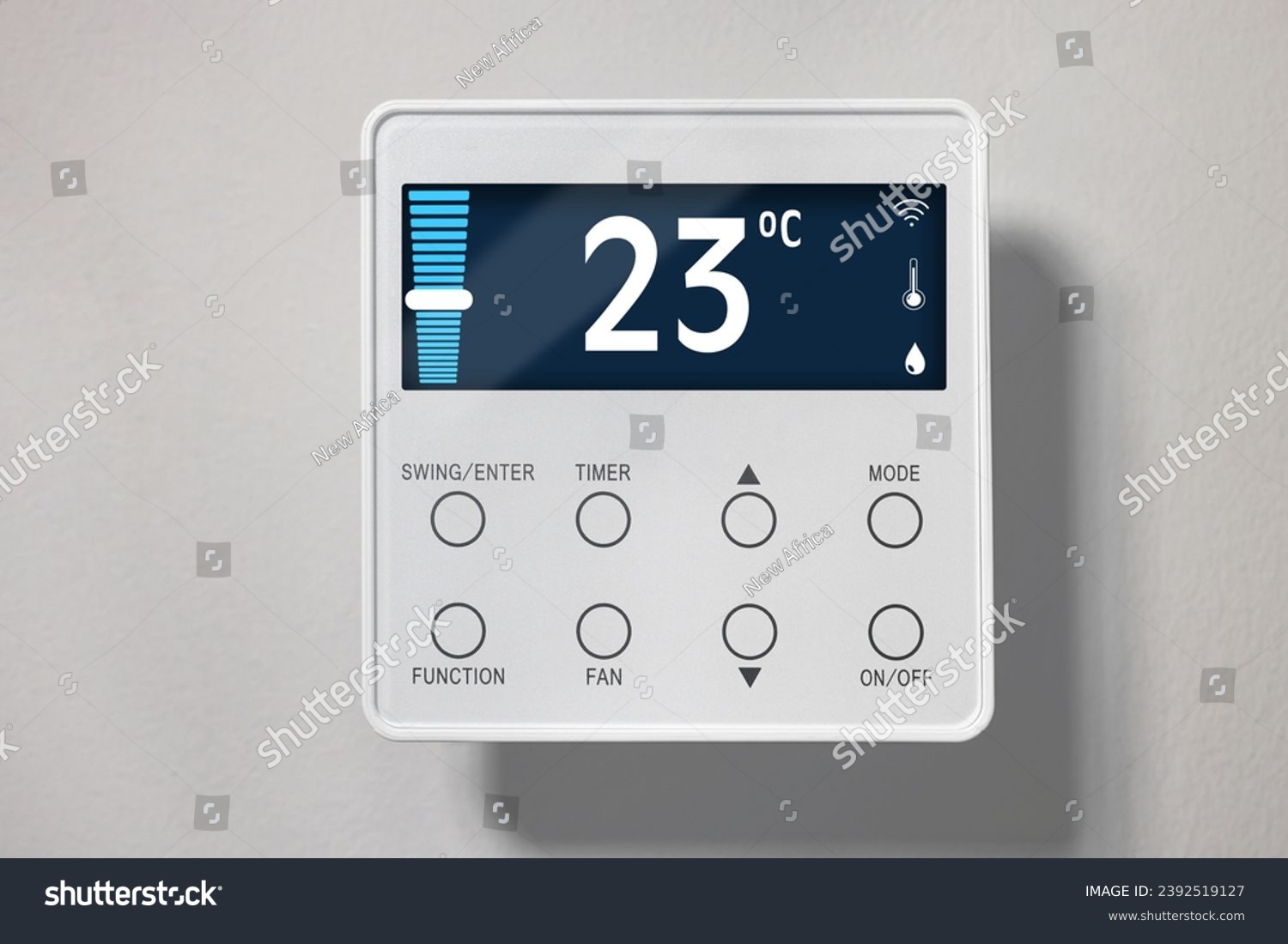 Thermostat displaying temperature in Celsius scale and different icons. Smart home device on ...