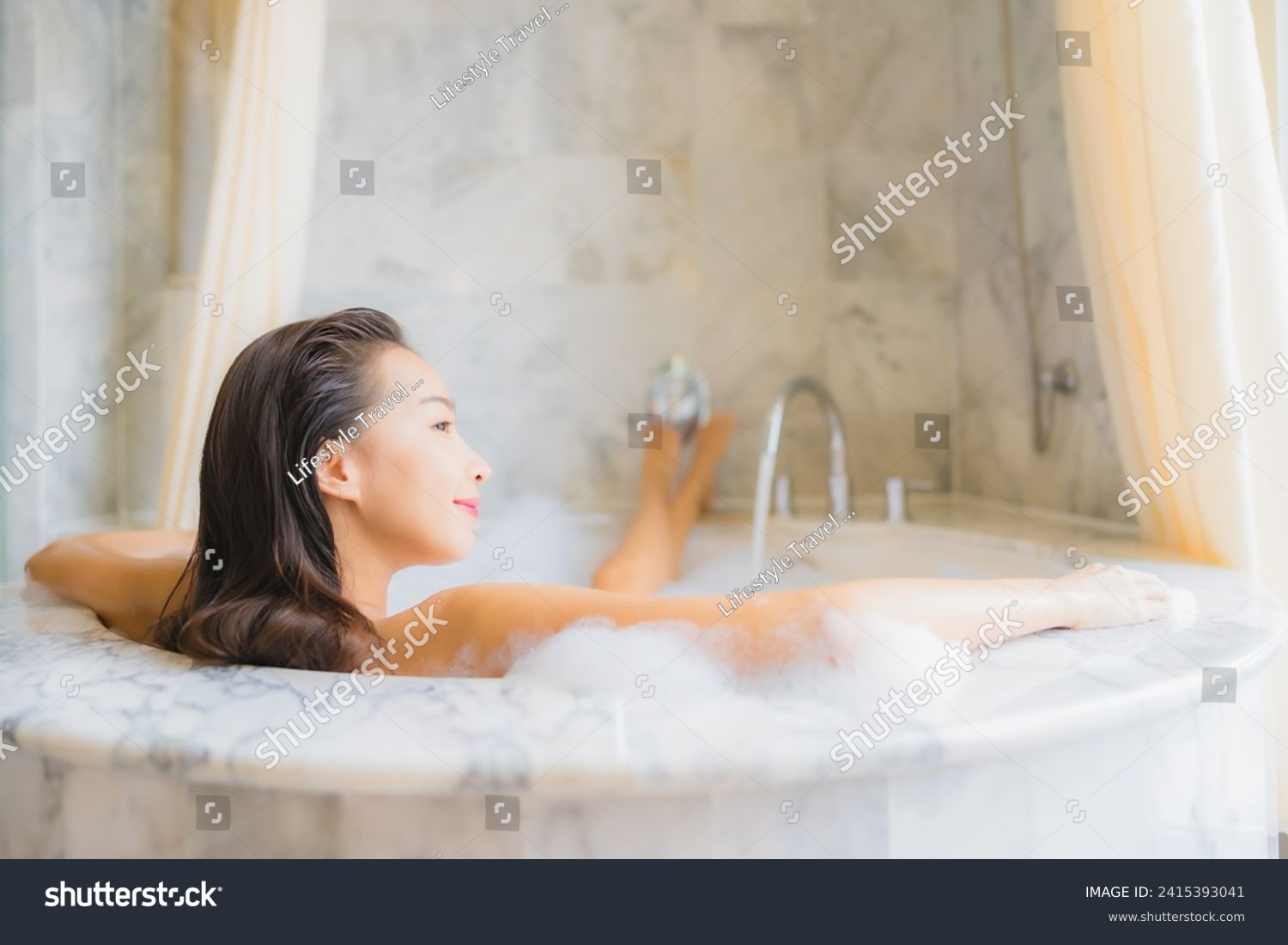Portrait beautiful young asian woman relax take a bath in bathtub in bathroom interior_站酷海洛_正版图片 ...