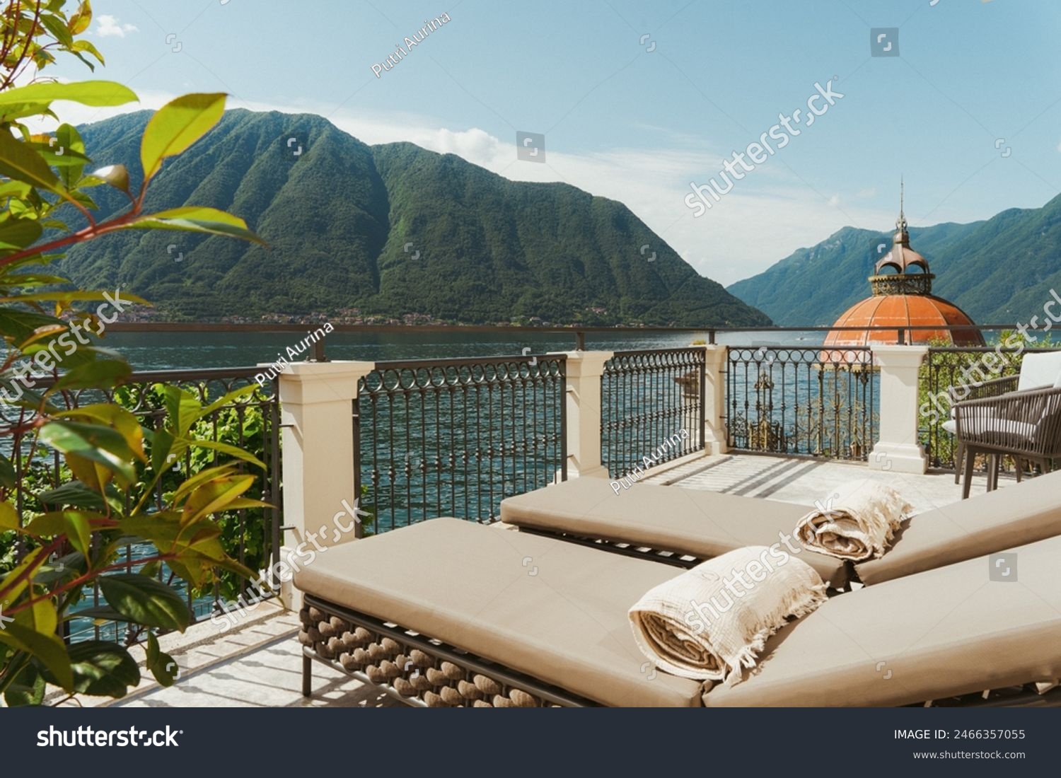 A luxury 5 star hotel facility an outdoor private patio with Como lake ...