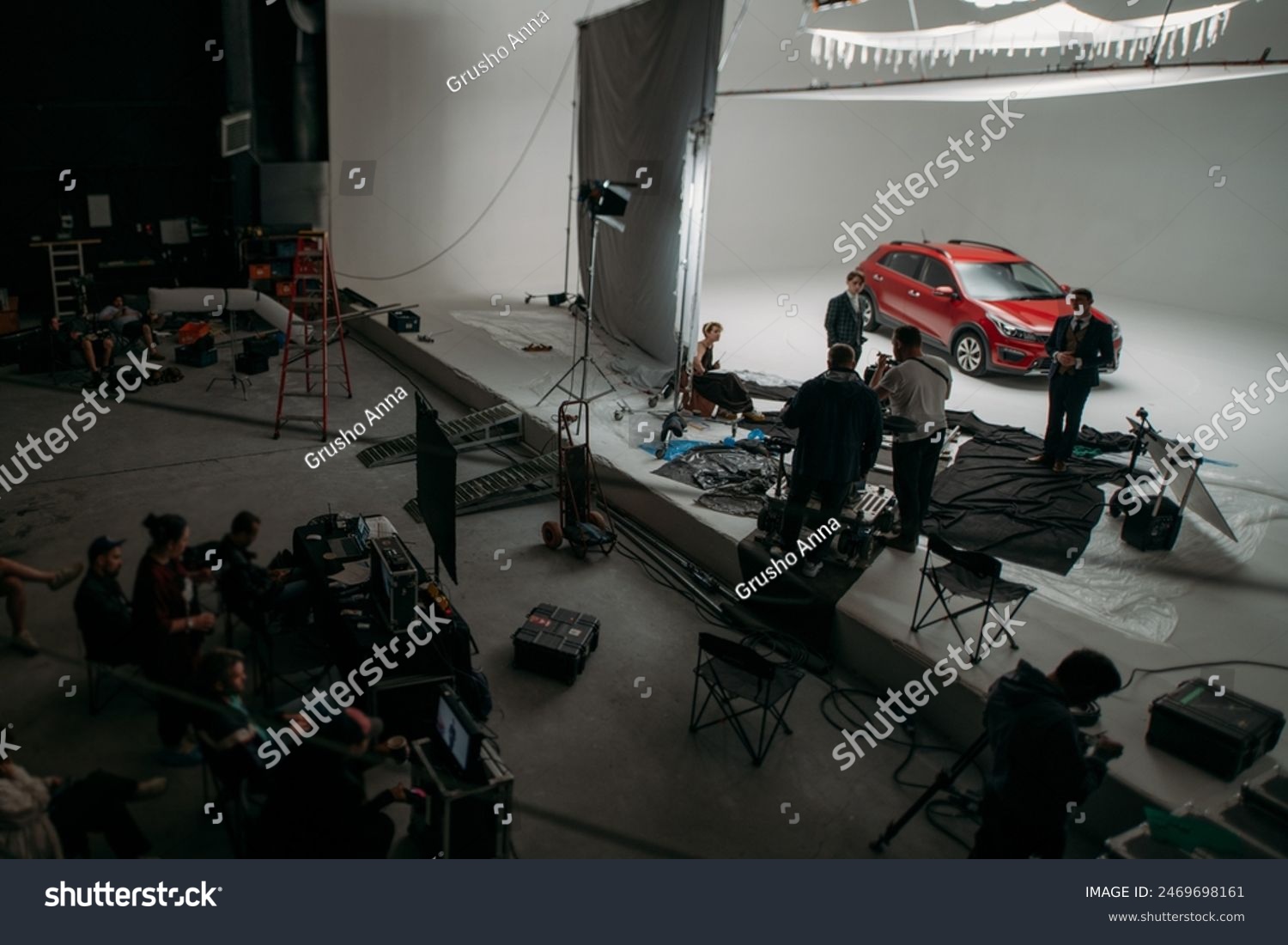 Film set monitors and modern shooting equipment. Film crew lighting ...