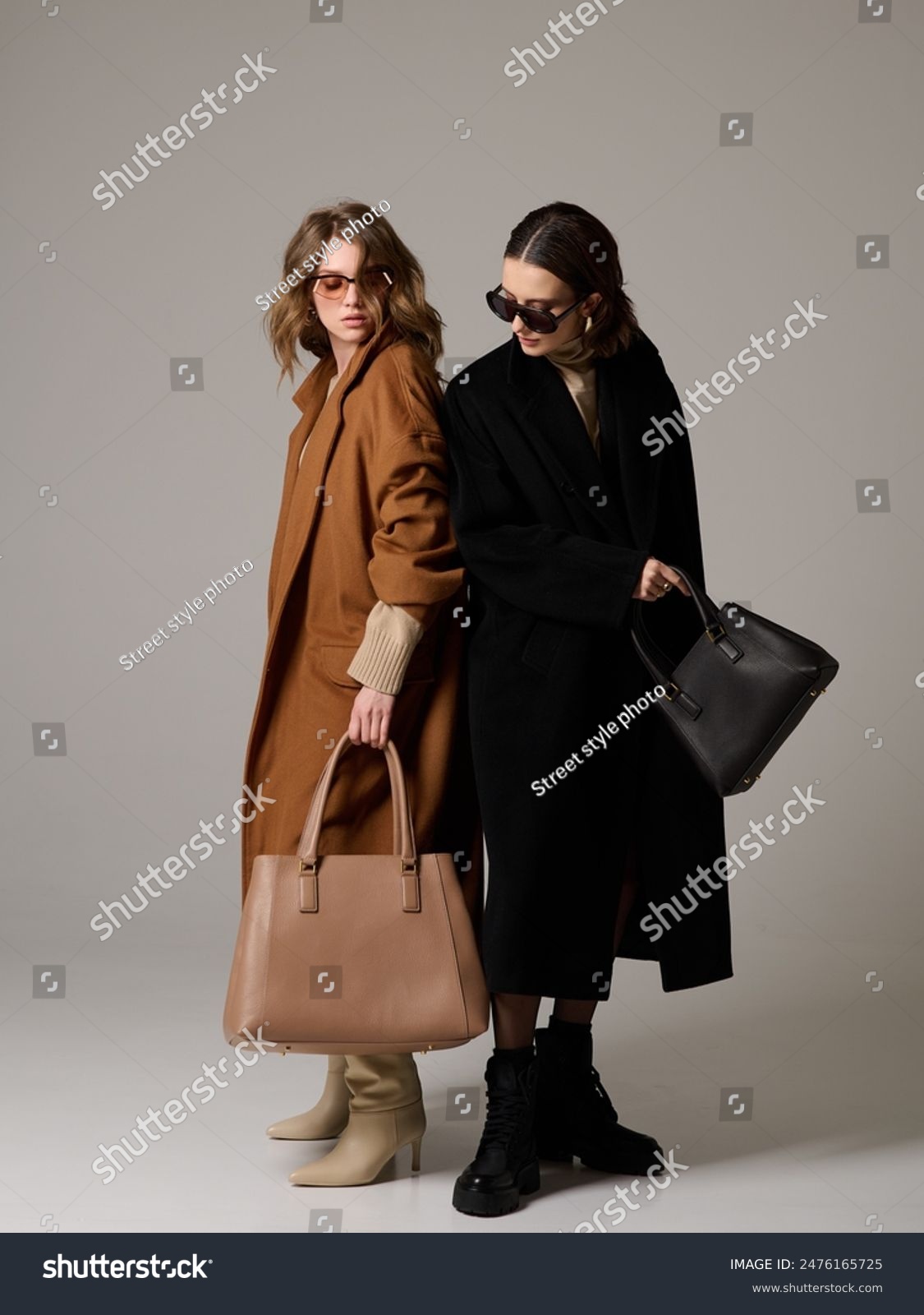 Fashion shooting in studio . Professional models fashionable clothes ...