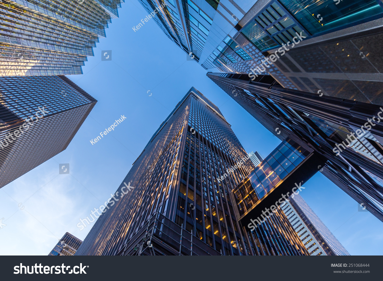 Office Buildings Stretch Up To The Blue Sky In The Financial District office-buildings-stretch-up-to-the-blue-sky-in-the-financial-district