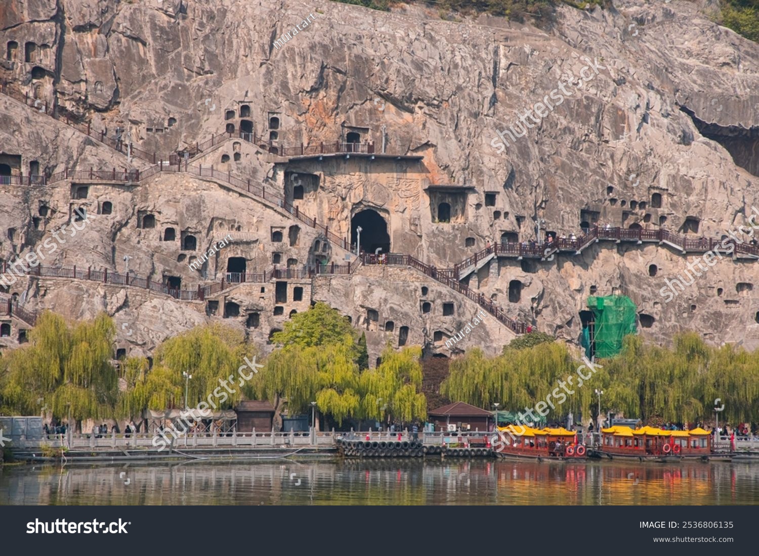 Longmen Grottoes Buddha relief Luoyang Henan - View of Longmen Grottoes ...
