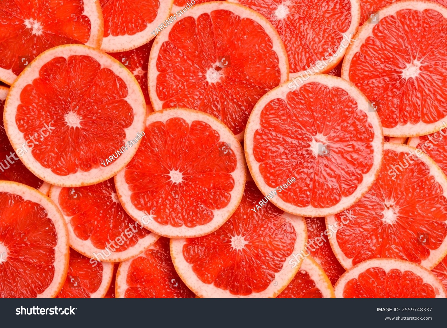 Grapefruit slices close-up. Top view citrus fruits._站酷海洛_正版图片_视频_字体_音乐素材交易平台_站酷旗下品牌