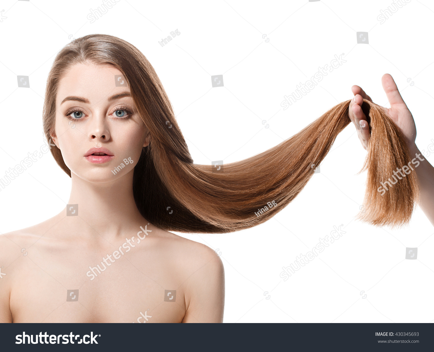 Beautiful woman with healthy long hair keep hair in hand with nature ...