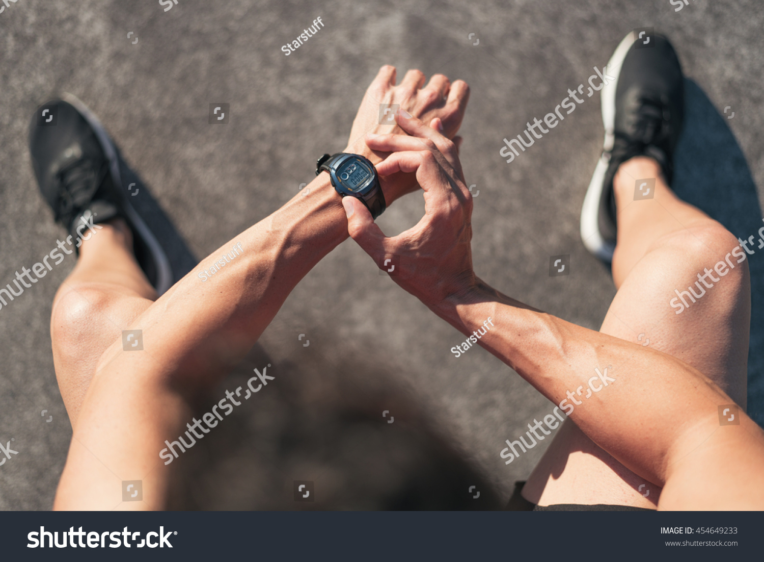 Fitness man resting during outdoor cross training workout reseting ...