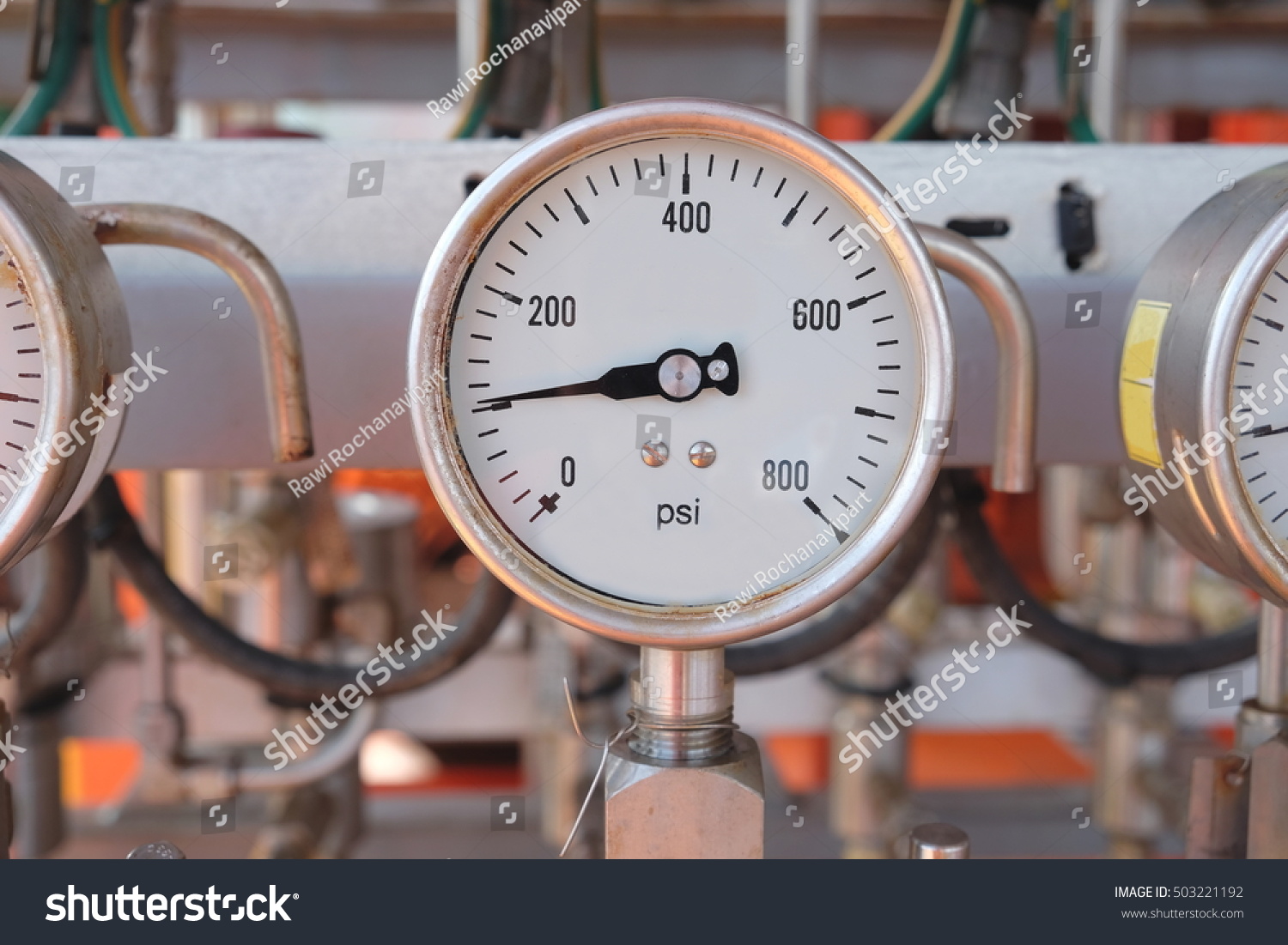 Pressure gauge measuring instrument close up on pneumatic control ...