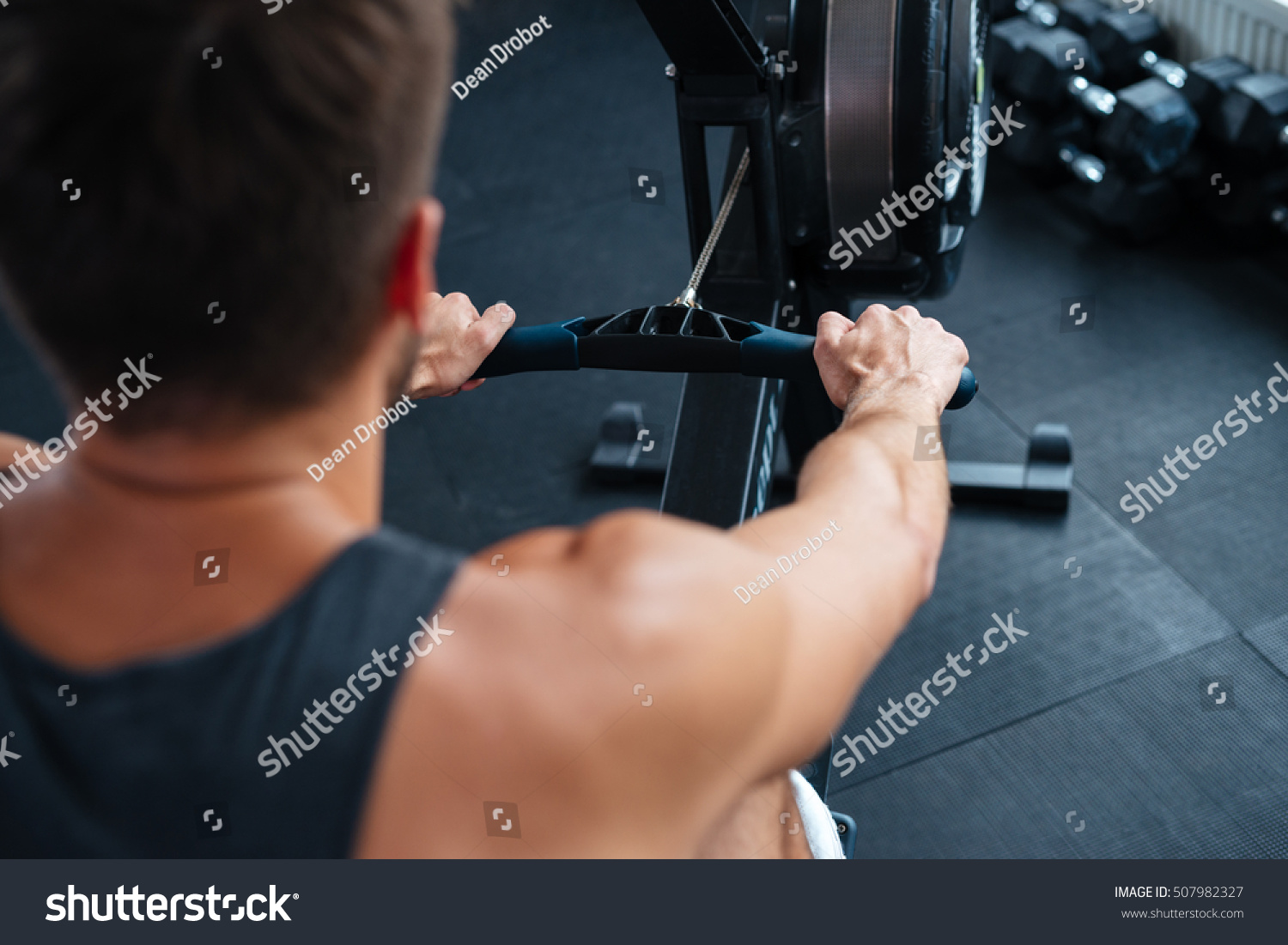 Photo from the back of fitness man. Exercise for your hands_站酷海洛_正版图片 ...