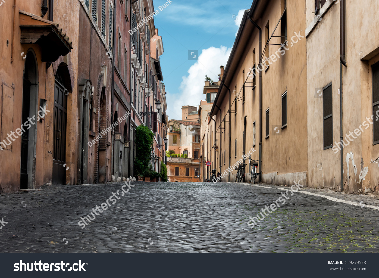 Roman street in the heart on Rome Italy side street with buildings ...