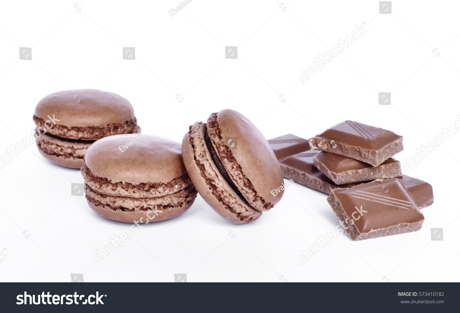 Delicious brown colored macaroons isolated on white background. Studio ...