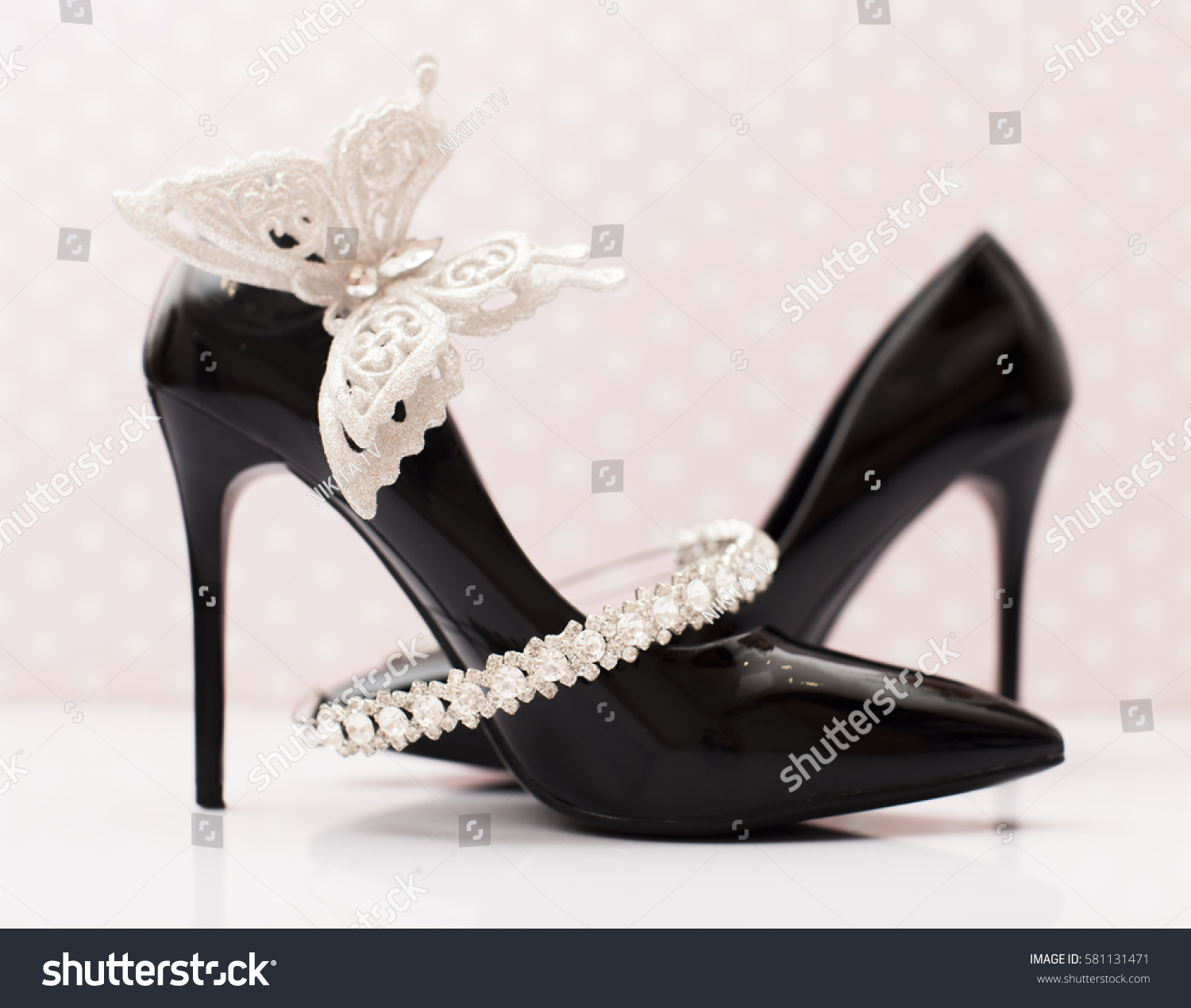 Top view of new pair of black stylish shoes. Pair of beige women's high ...