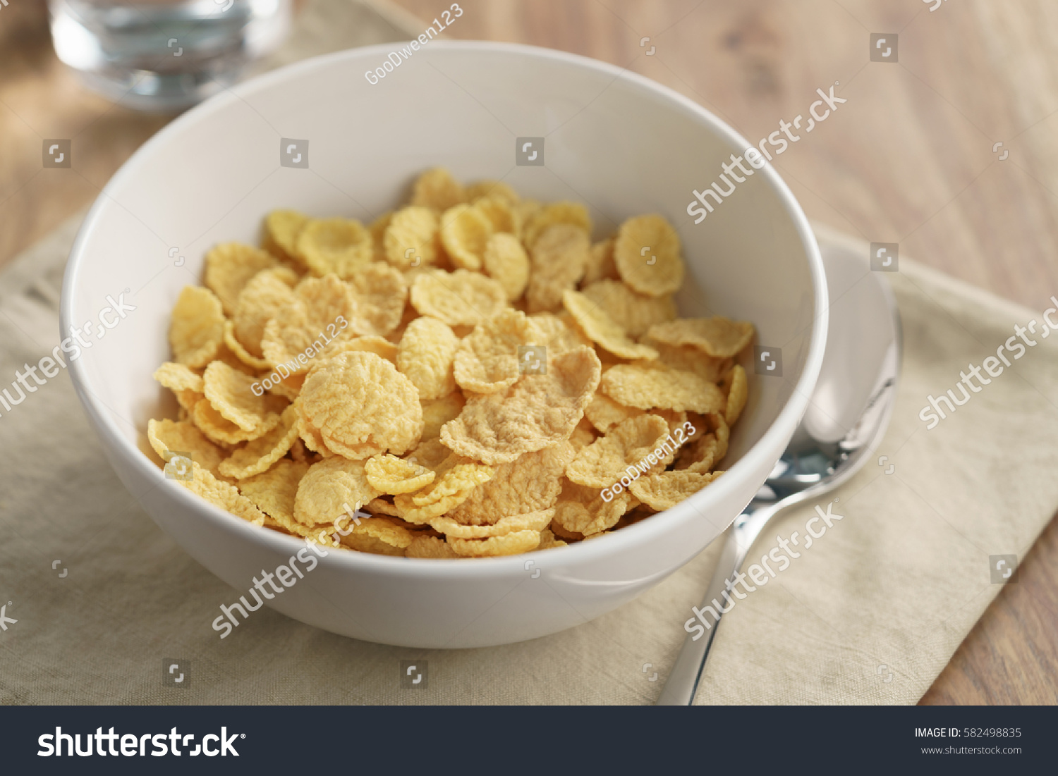 dry corn flakes for breakfast in bowl on table breakfast preparation_站酷 ...