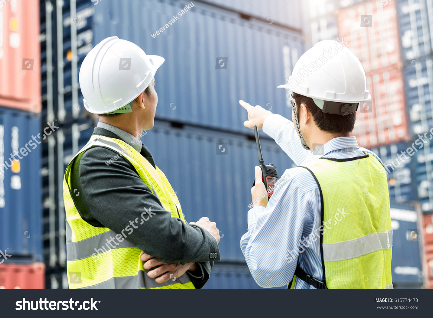 foreman control Industrial Container Cargo freight ship from his ...