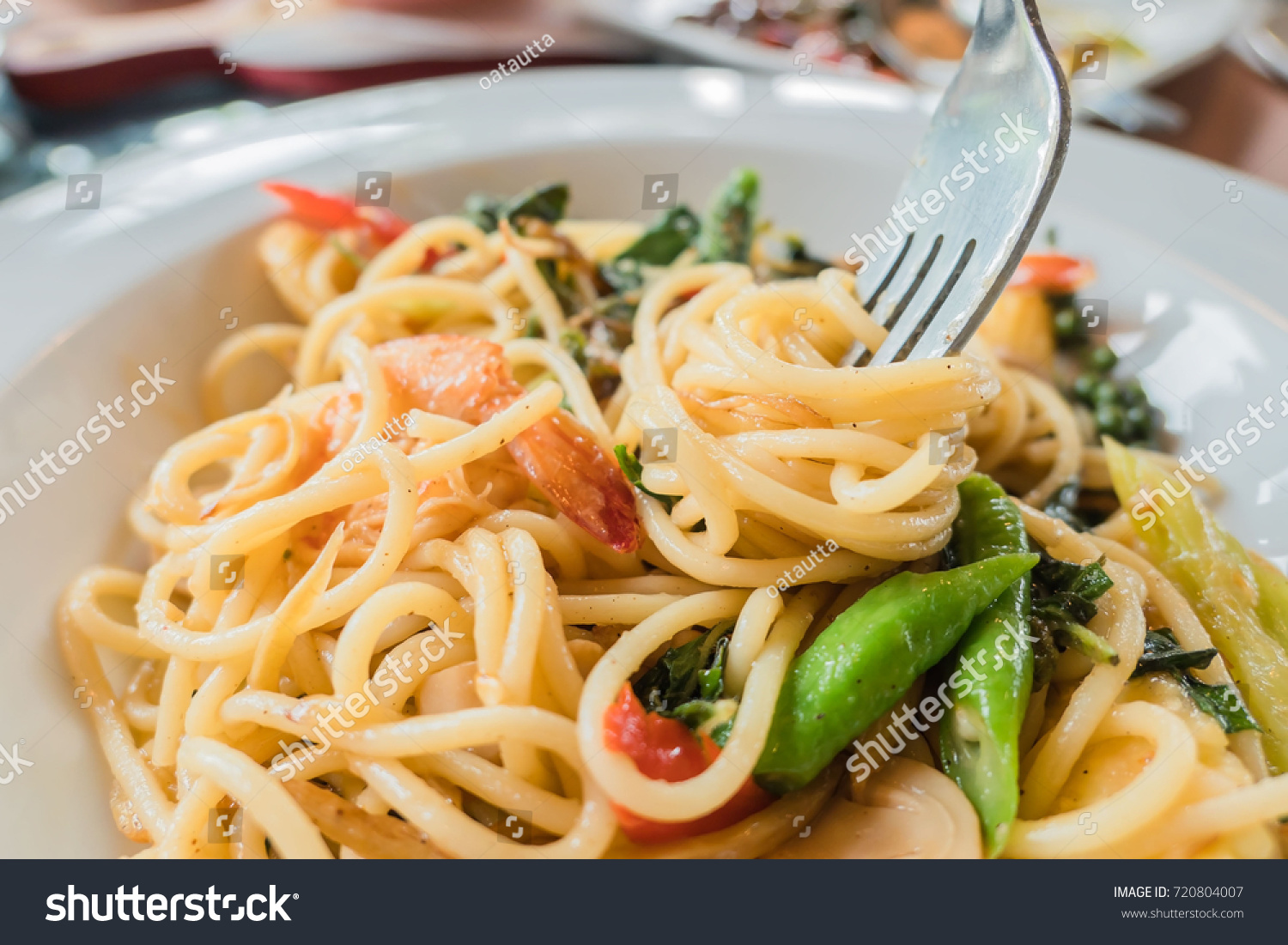 closeup Spaghetti with Cutlery on white plate . Italian food ._站酷海洛_正版 ...