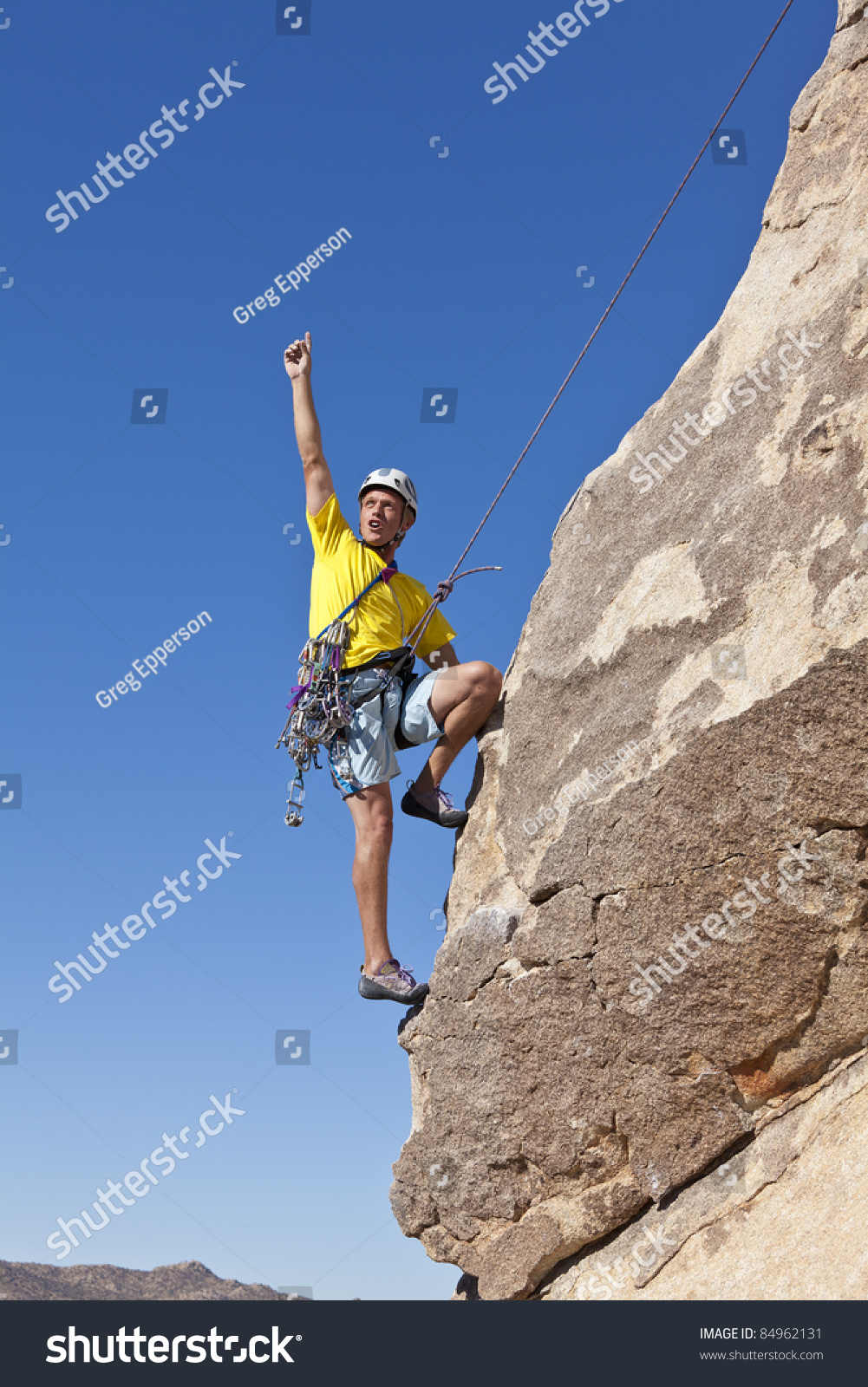 Male rock climber celebrates after a successful ascent._站酷海洛_正版图片_视频_字体 ...